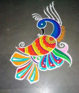 50 Admirable Peacock Rangoli designs that you can try - Wedandbeyond